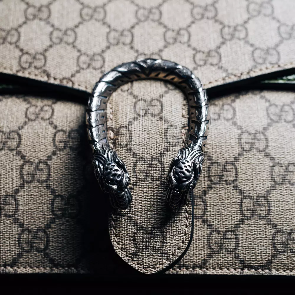 Gucci Dionysus GG Supreme Python Shoulder Bag, $2,900 ຜ່ານ Gucci