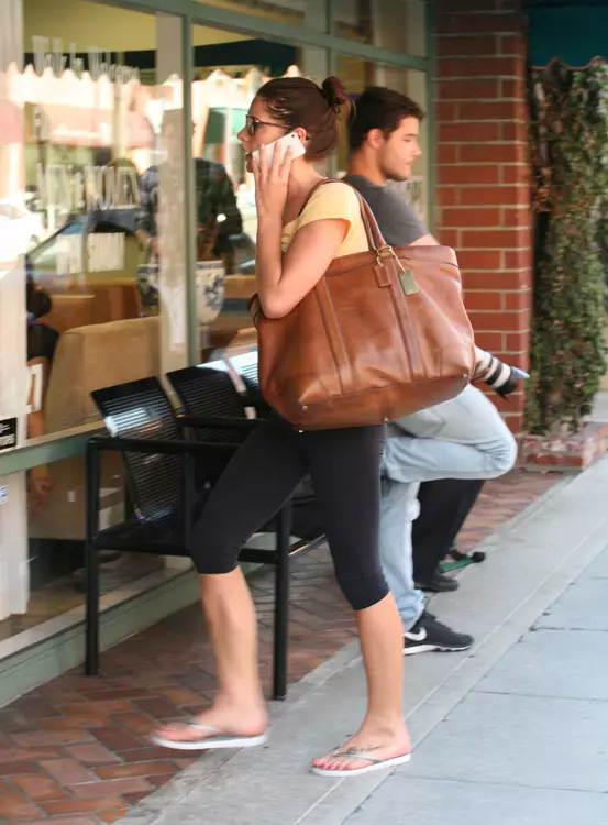 Ashley Greene hat in Coach Bleecker Legacy Weekend Tote (3)